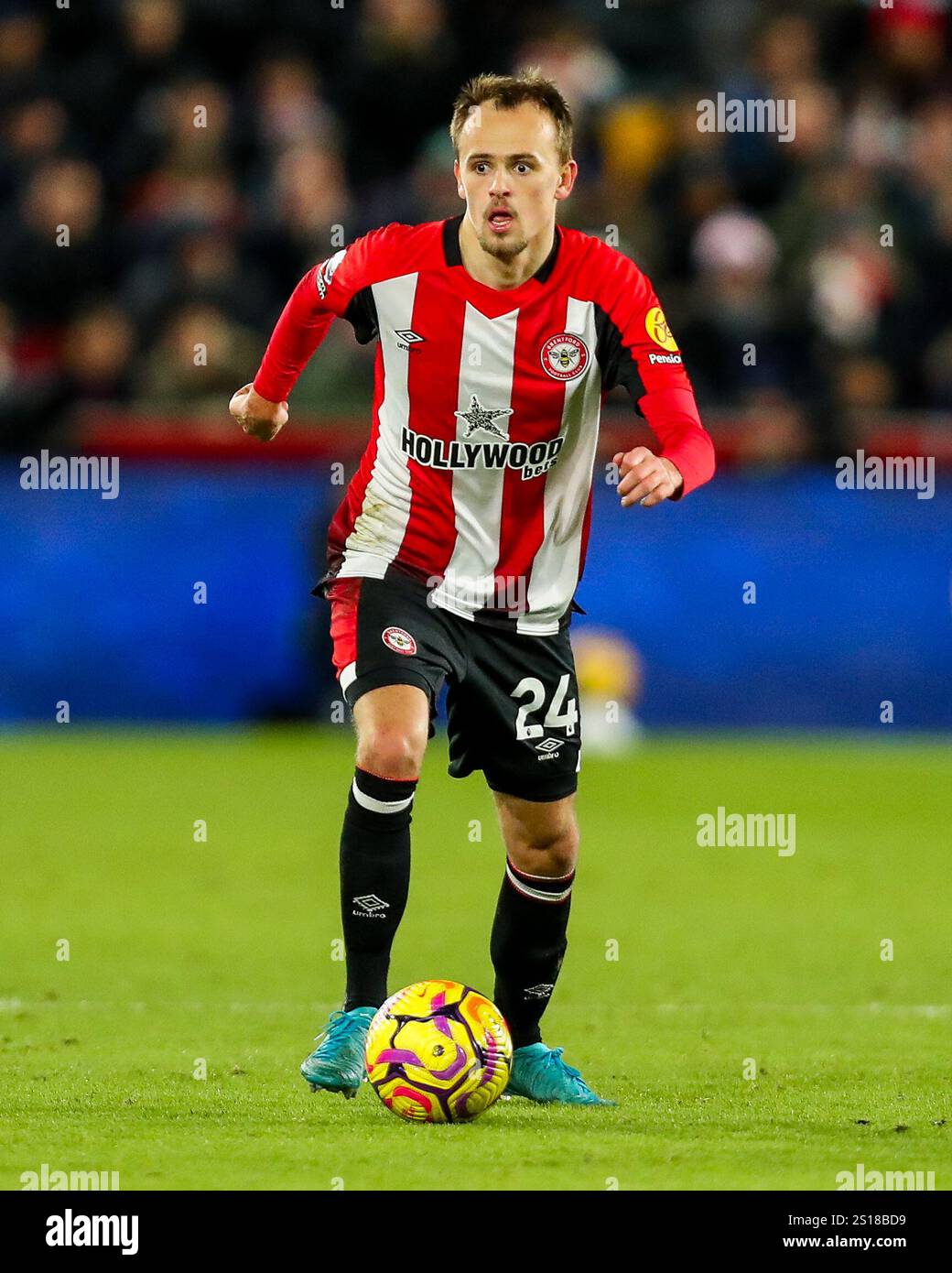 London, UK. 01st Jan, 2025. Mikkel Damsgaard of Brentford runs with the ...