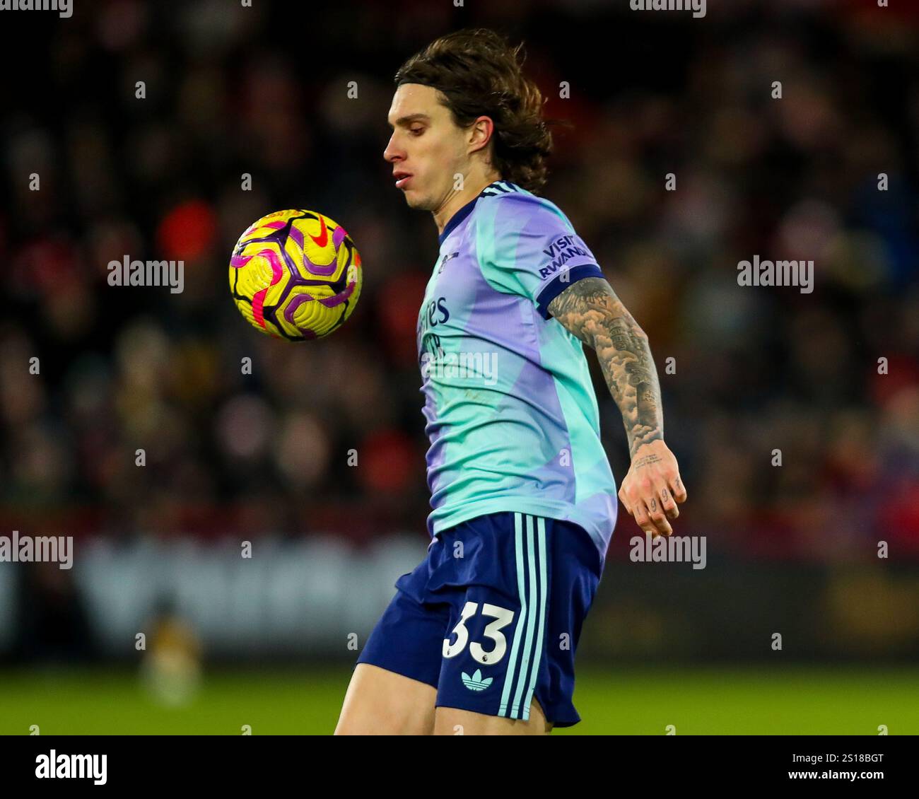 London, UK. 01st Jan, 2025. Riccardo Calafiori of Arsenal controls the ...