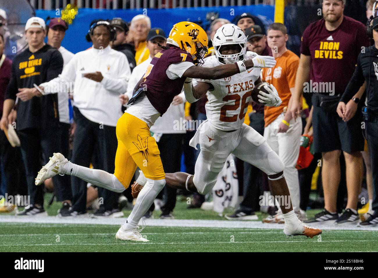 Atlanta, GA, USA. 1st Jan, 2025. Texas running back Quintrevion Wisner ...