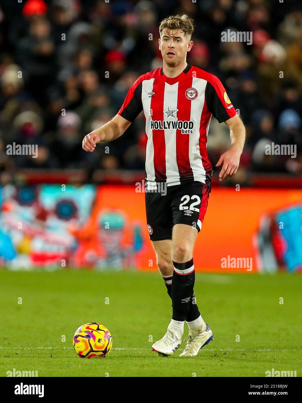 London, UK. 01st Jan, 2025. Nathan Collins of Brentford runs with the ...