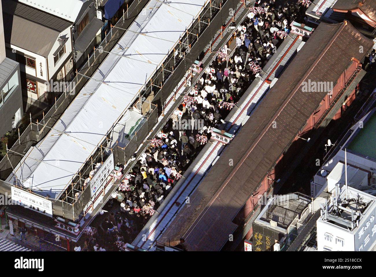 A shopping street leading to Senso-ji temple in Tokyo's Asakusa area is ...