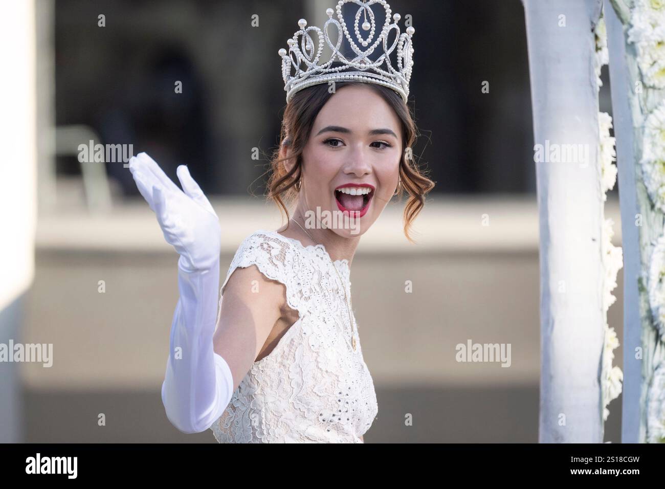 The 2025 Rose Queen Lindsay Charles waves to parade goers during the ...