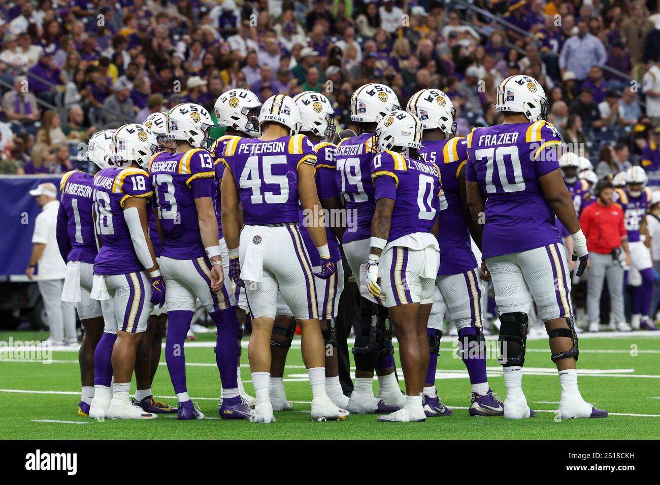 HOUSTON, TX - DECEMBER 31: The LSU Tigers huddle up before an offensive play during the football ...
