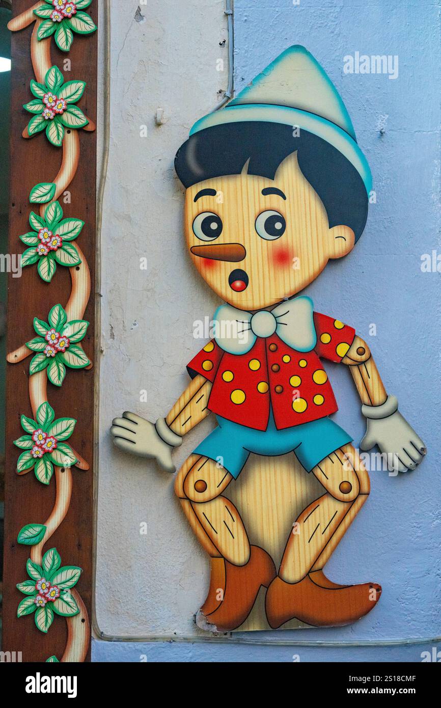 Pinocchio wooden wall artwork Stock Photo - Alamy