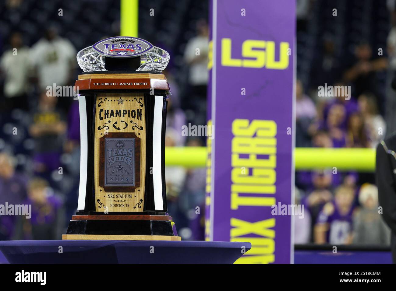 HOUSTON, TX - DECEMBER 31: The Texas Bowl trophy sits on a display ...