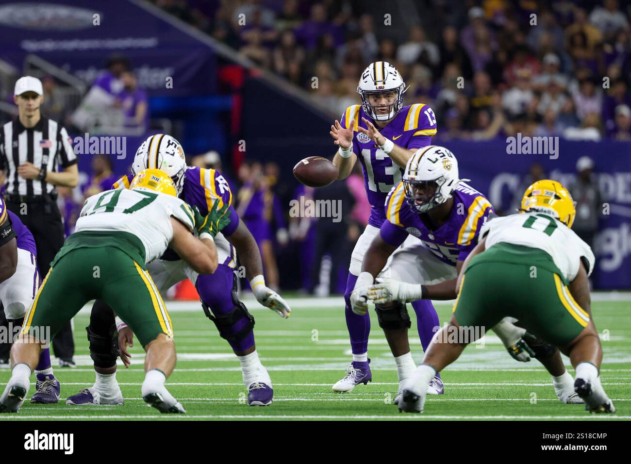 HOUSTON, TX - DECEMBER 31: LSU Tigers quarterback Garrett Nussmeier (13) takes a snap during the ...