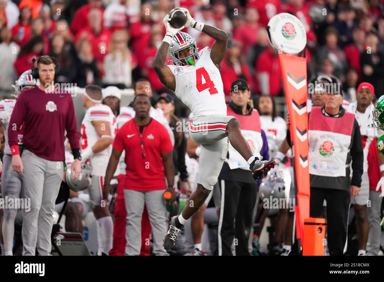 Ohio State wide receiver Jeremiah Smith (4) catches a pass during the second half in the ...