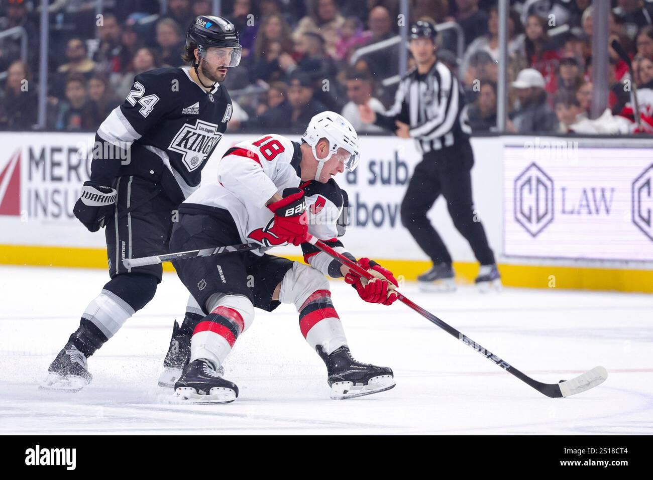 New Jersey Devils left wing Ondrej Palat, right, skates as Los Angeles ...