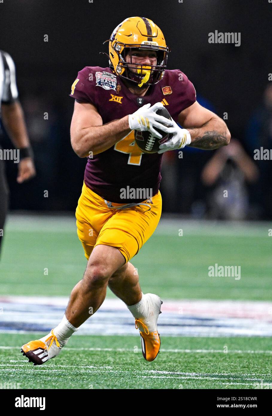 ATLANTA, GA – JANUARY 01: Running Back Cam Skattebo #4 of the Arizona ...