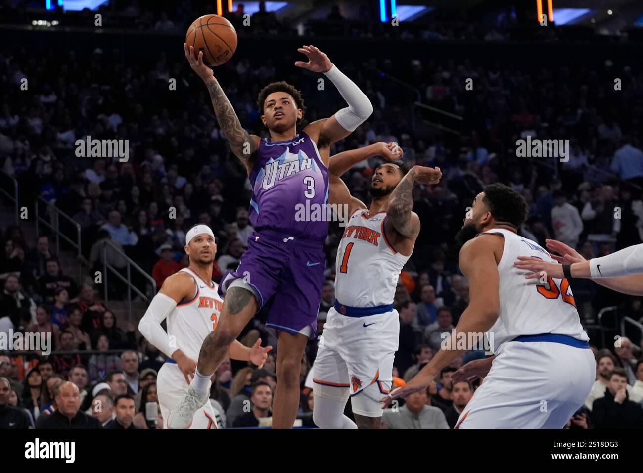 Utah Jazz's Keyonte George (3) drives past New York Knicks' Cameron ...
