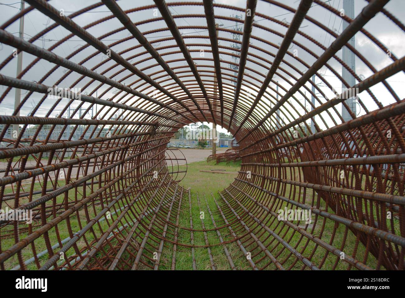 View down rusty round rebar tube reinforcement leading lines to ...
