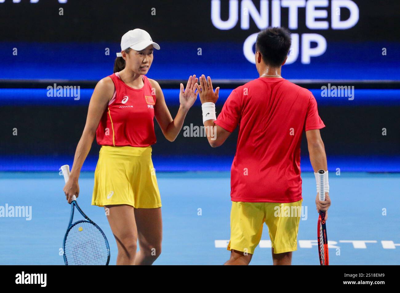 (250102) -- PERTH, Jan. 2, 2025 (Xinhua) -- Zhang Shuai(L)/Sun Fajing ...