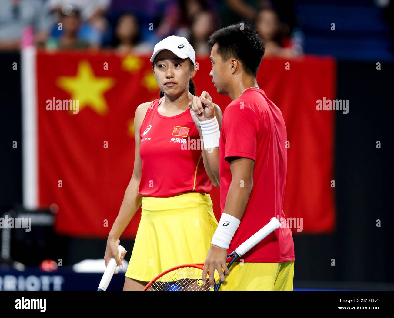 (250102) -- PERTH, Jan. 2, 2025 (Xinhua) -- Zhang Shuai(L)/Sun Fajing ...