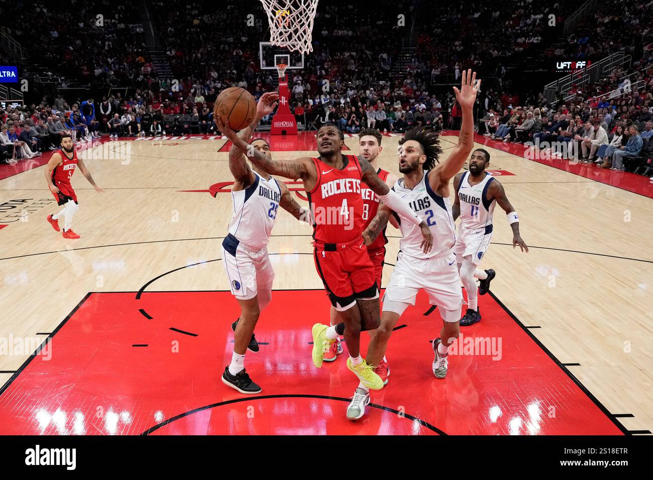 Houston Rockets' Jalen Green (4) goes up for a shot as Dallas Mavericks ...