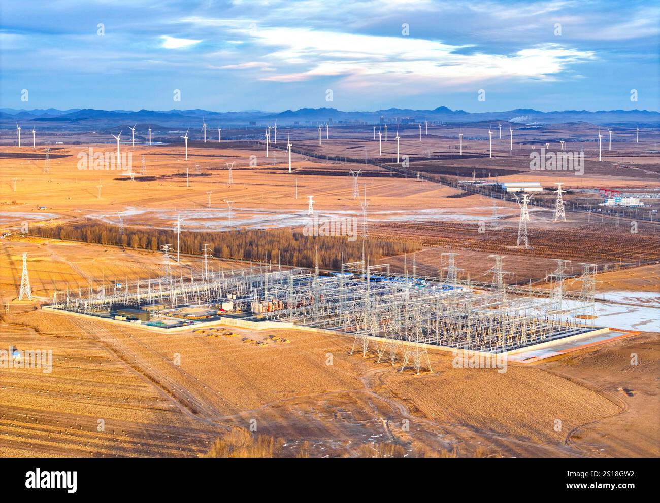 Photo taken on January 2, 2025 shows sunrise at a 500 kilovolt wind ...