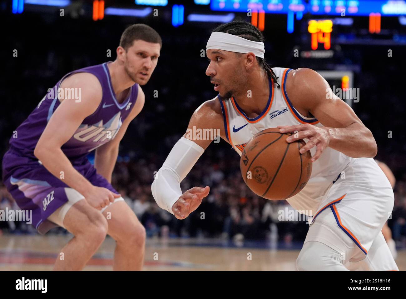 New York Knicks' Josh Hart, right, drives past Utah Jazz's Svi ...