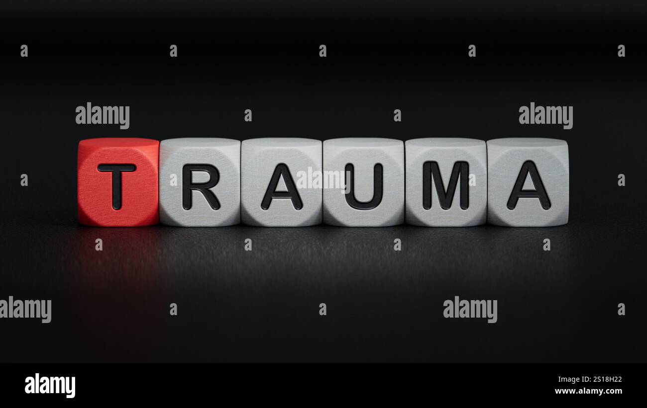 The word trauma written on wooden cubes.close up of wooden elements ...