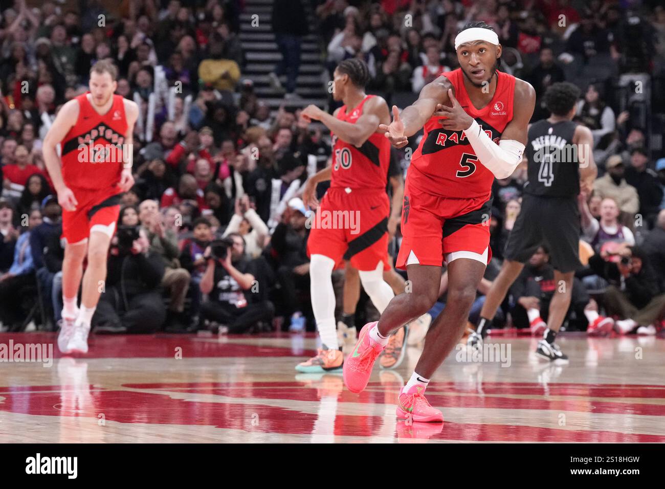 Toronto Raptors Immanuel Quickley (5) celebrates after scoring against ...