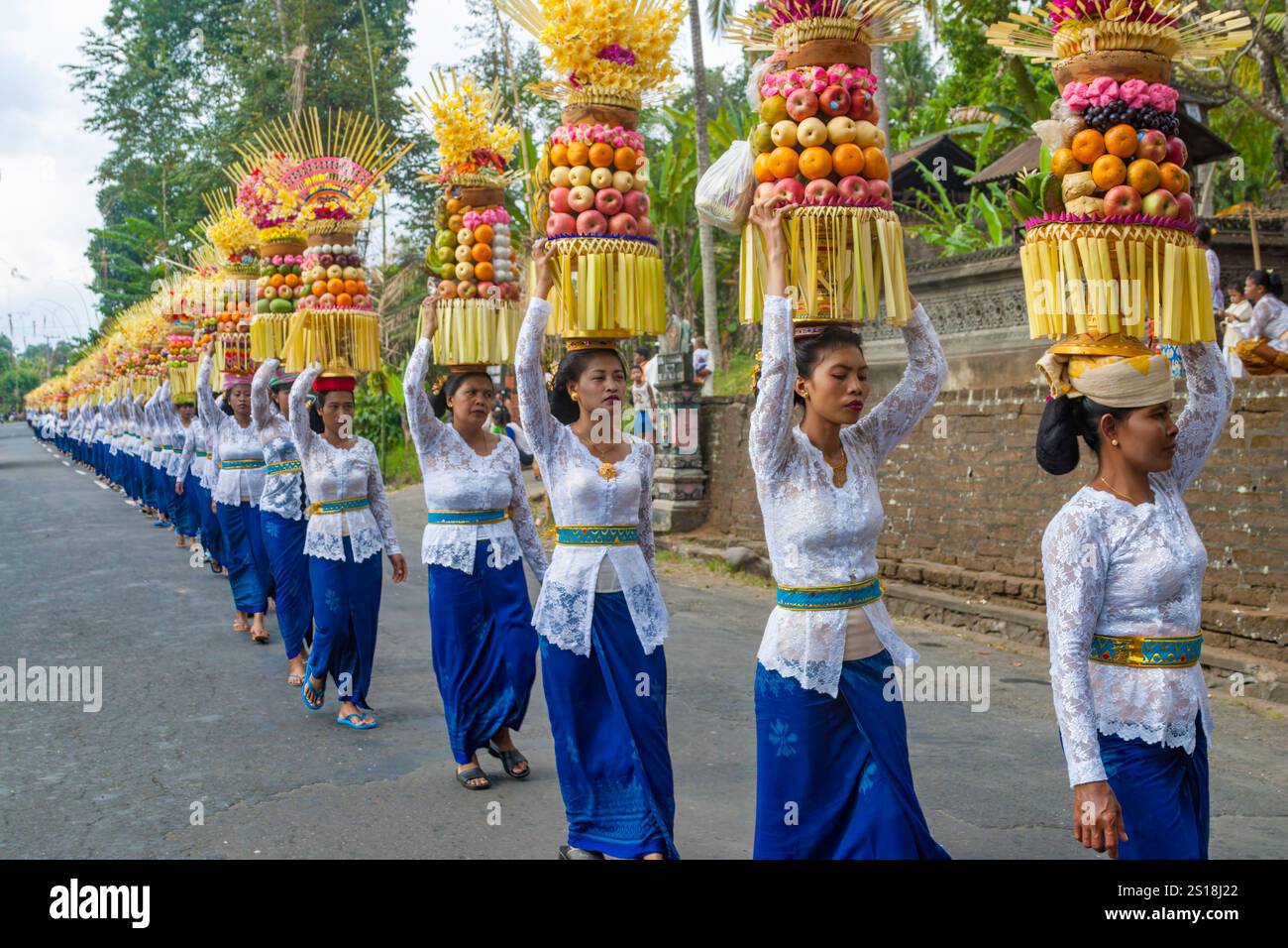 A seemingly endless precession of women in traditional costumes ...