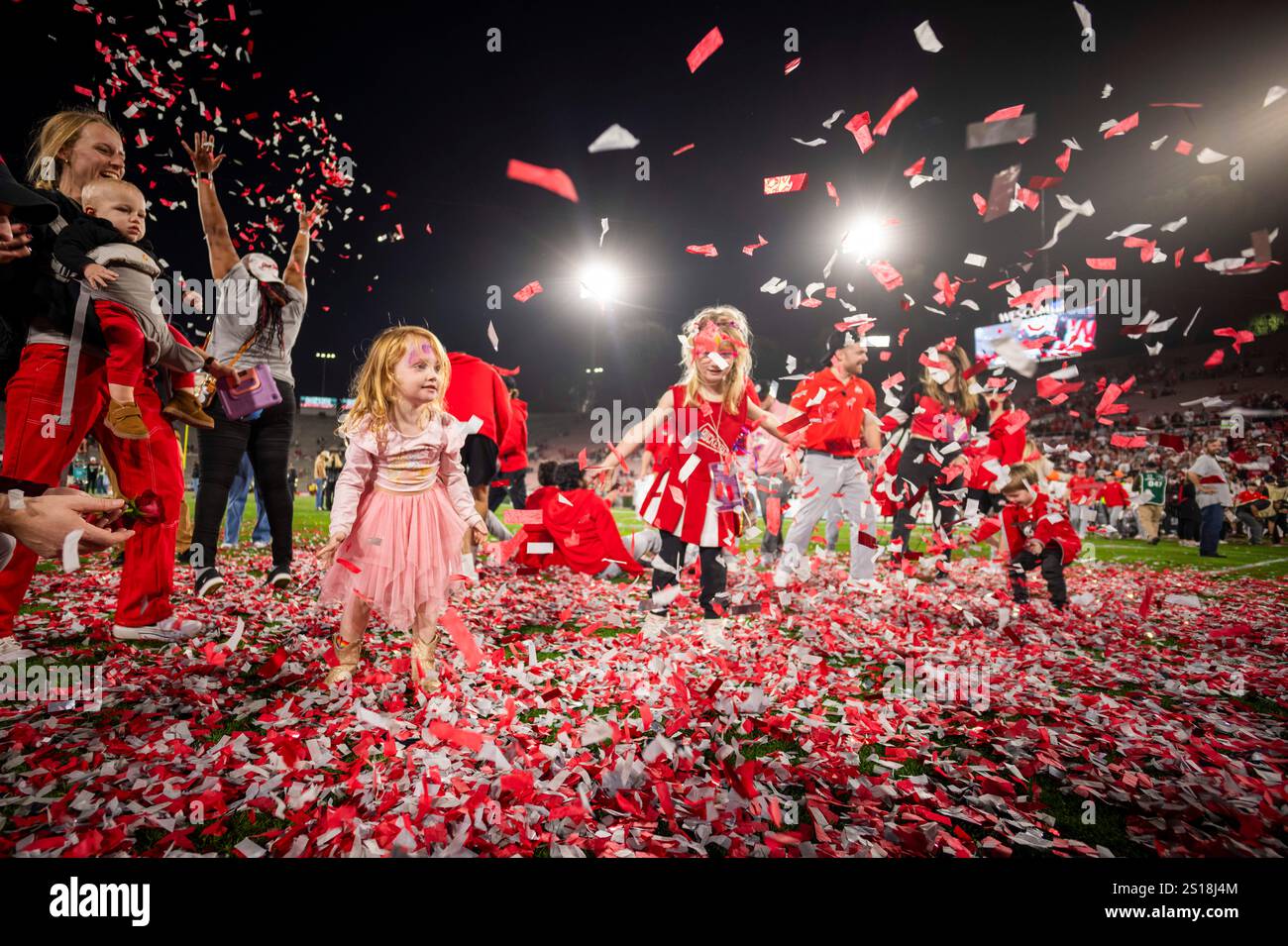 Los Angeles, California, USA. 1st Jan, 2025. Kids play confetti after ...