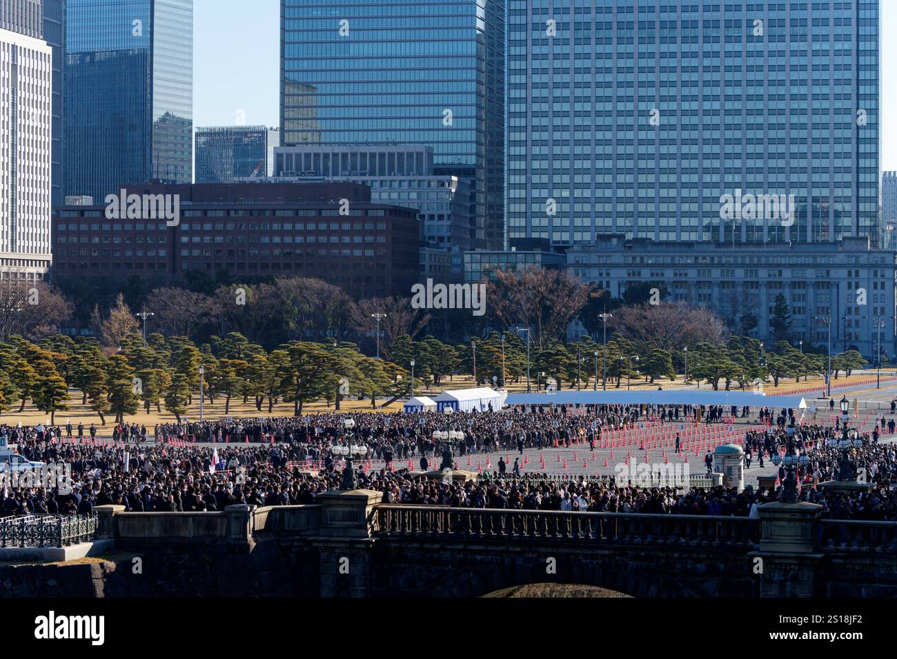 Tokyo, Japan. 2nd Jan, 2025. People walks into the Imperial Palace in ...