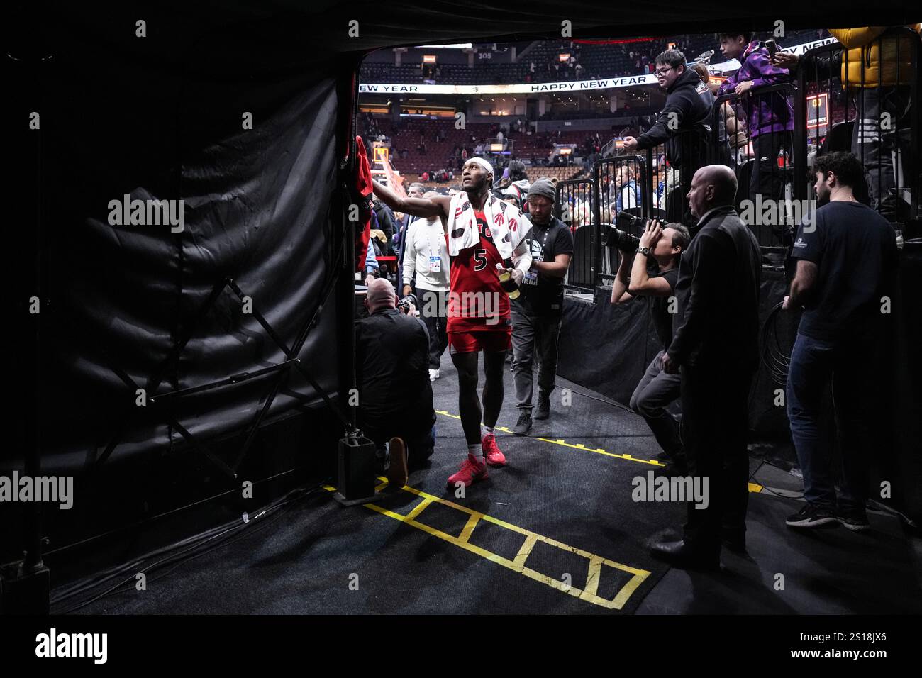 Toronto, Can. 01st Jan, 2025. Toronto Raptors' Immanuel Quickley (5 ...