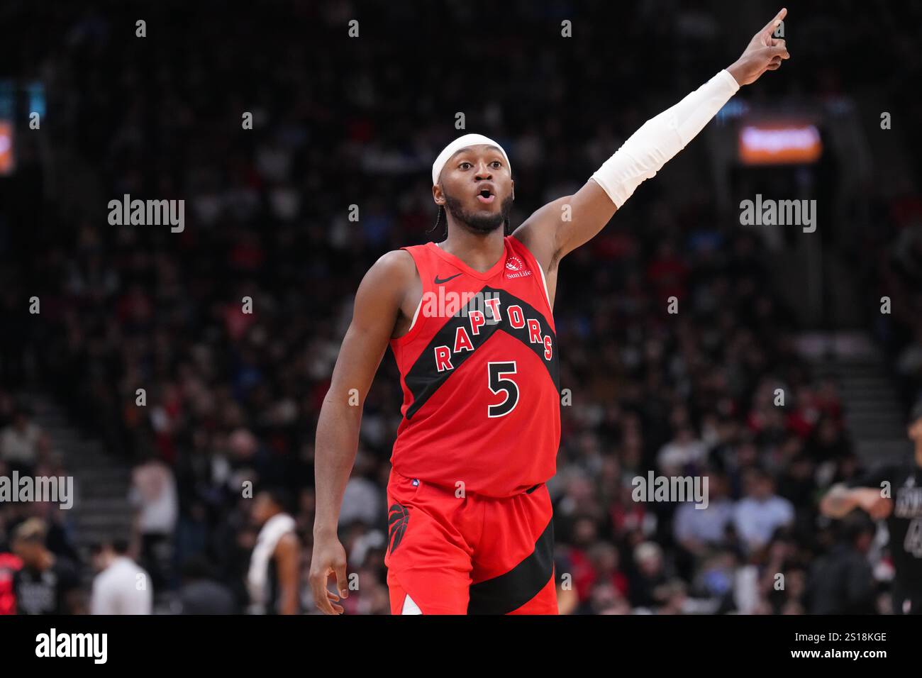 Toronto, Can. 01st Jan, 2025. Toronto Raptors' Immanuel Quickley (5 ...