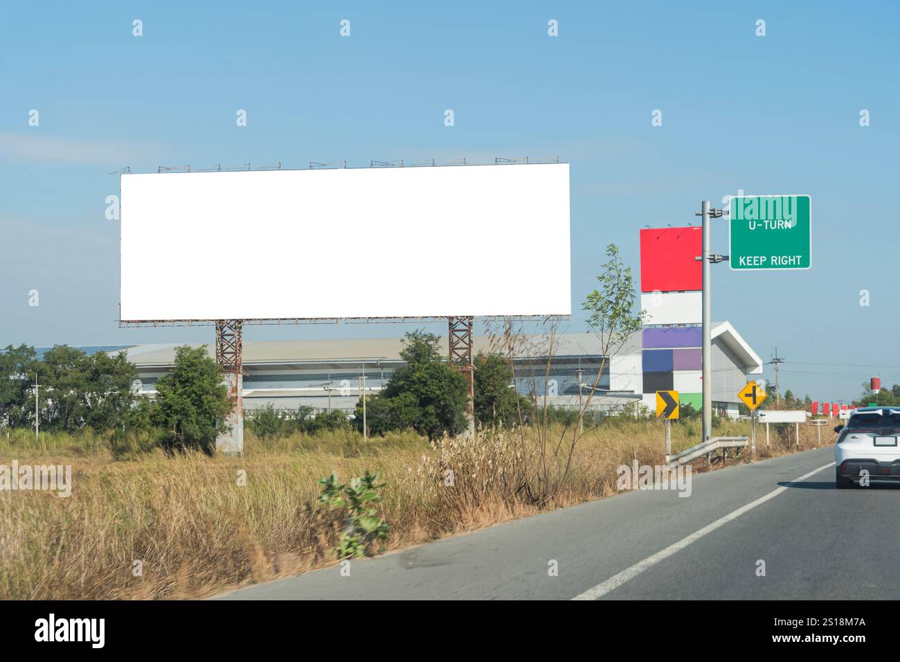 Large horizontal blank sign on a highway in Bangkok, Thailand. Traffic ...