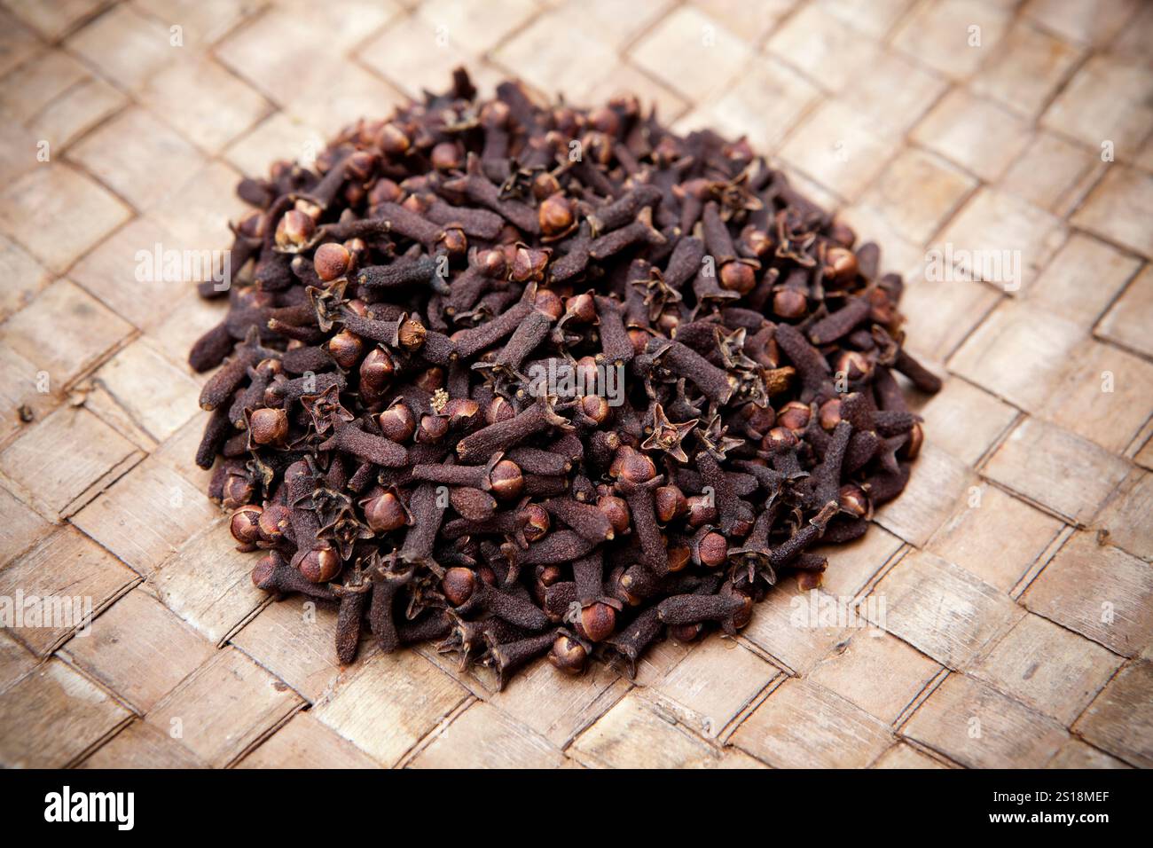 Cloves are the aromatic flower buds of a tree in the family Myrtaceae, Syzygium aromaticum. They ...