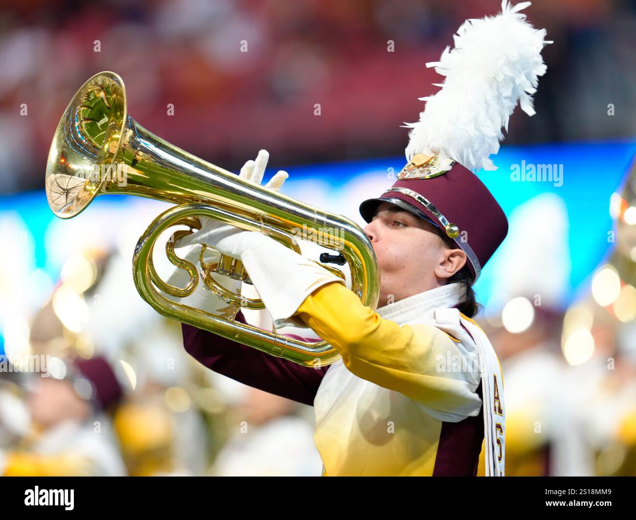 A member of the Arizona State band performs before the start of the ...