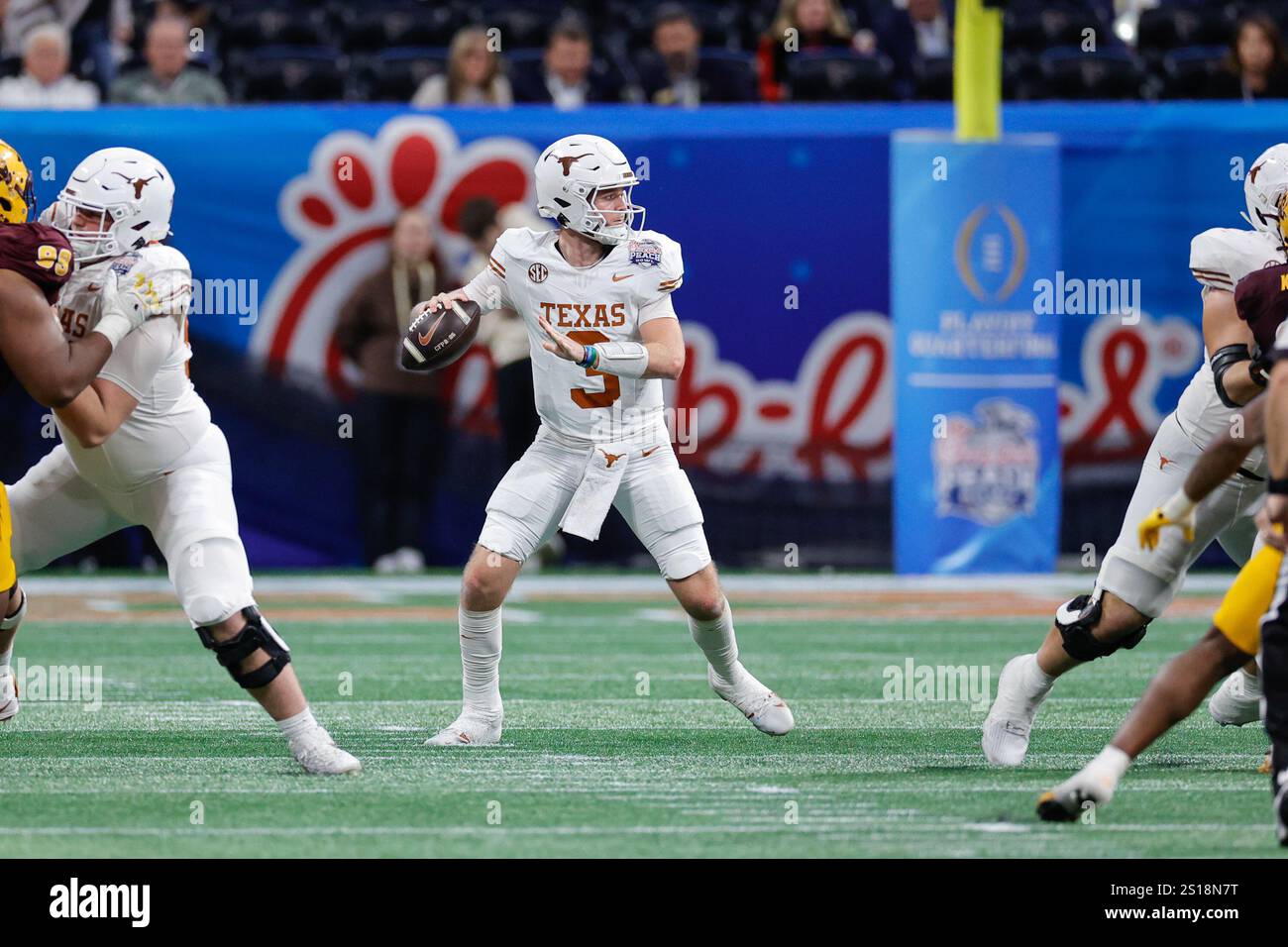 Atlanta, Georgia. 1st Jan, 2025. Quinn Ewers (3) of Texas looks for a ...