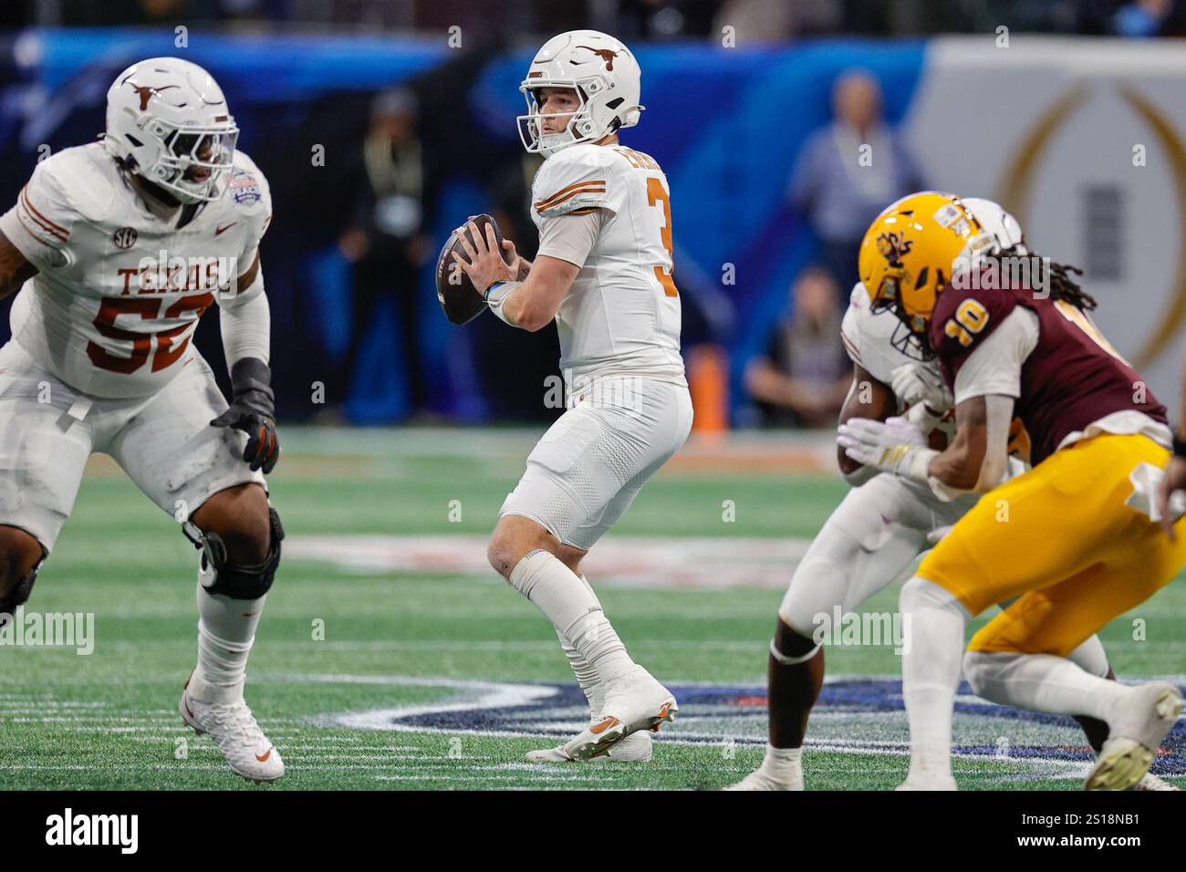 Atlanta, Georgia. 1st Jan, 2025. Quinn Ewers (3) of Texas looks for a ...