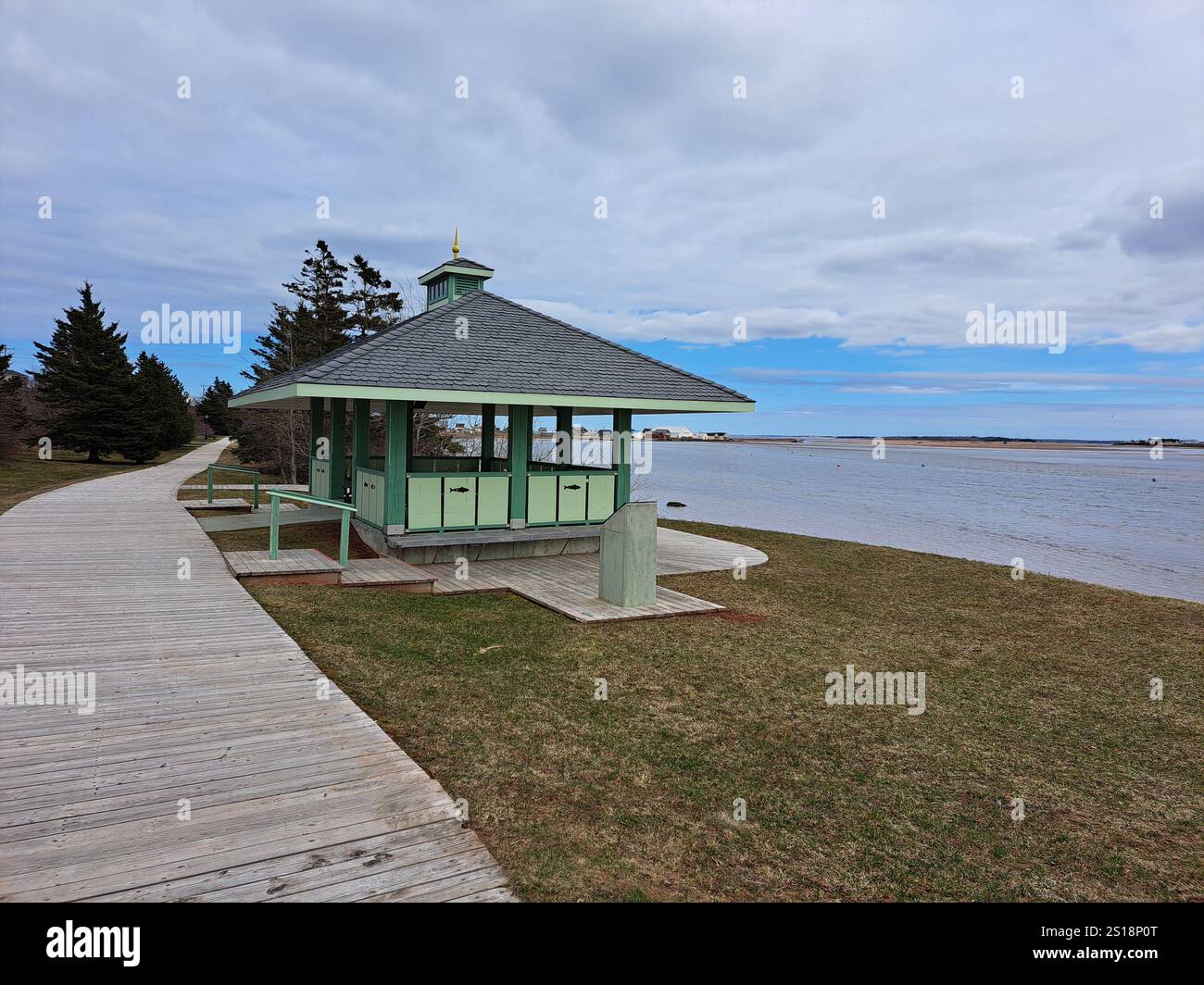 Wooden shelter on the boardwalk at the promenade in North Rustico, Prince Edward Island, Canada ...