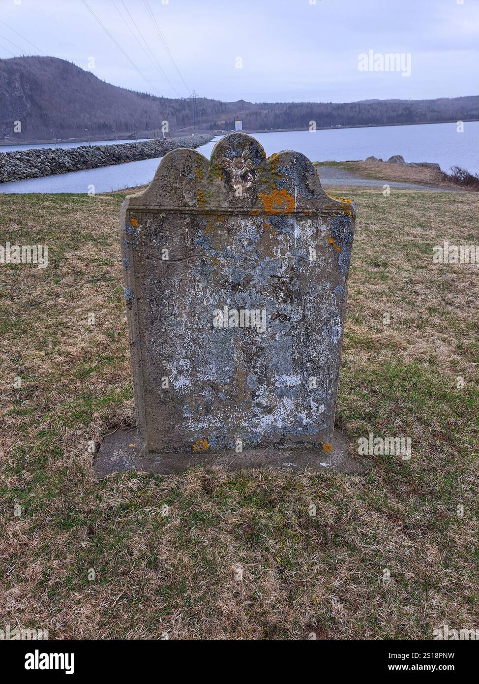 Weathered grave stones at the Canso Range Rear Lighthouse in Port ...