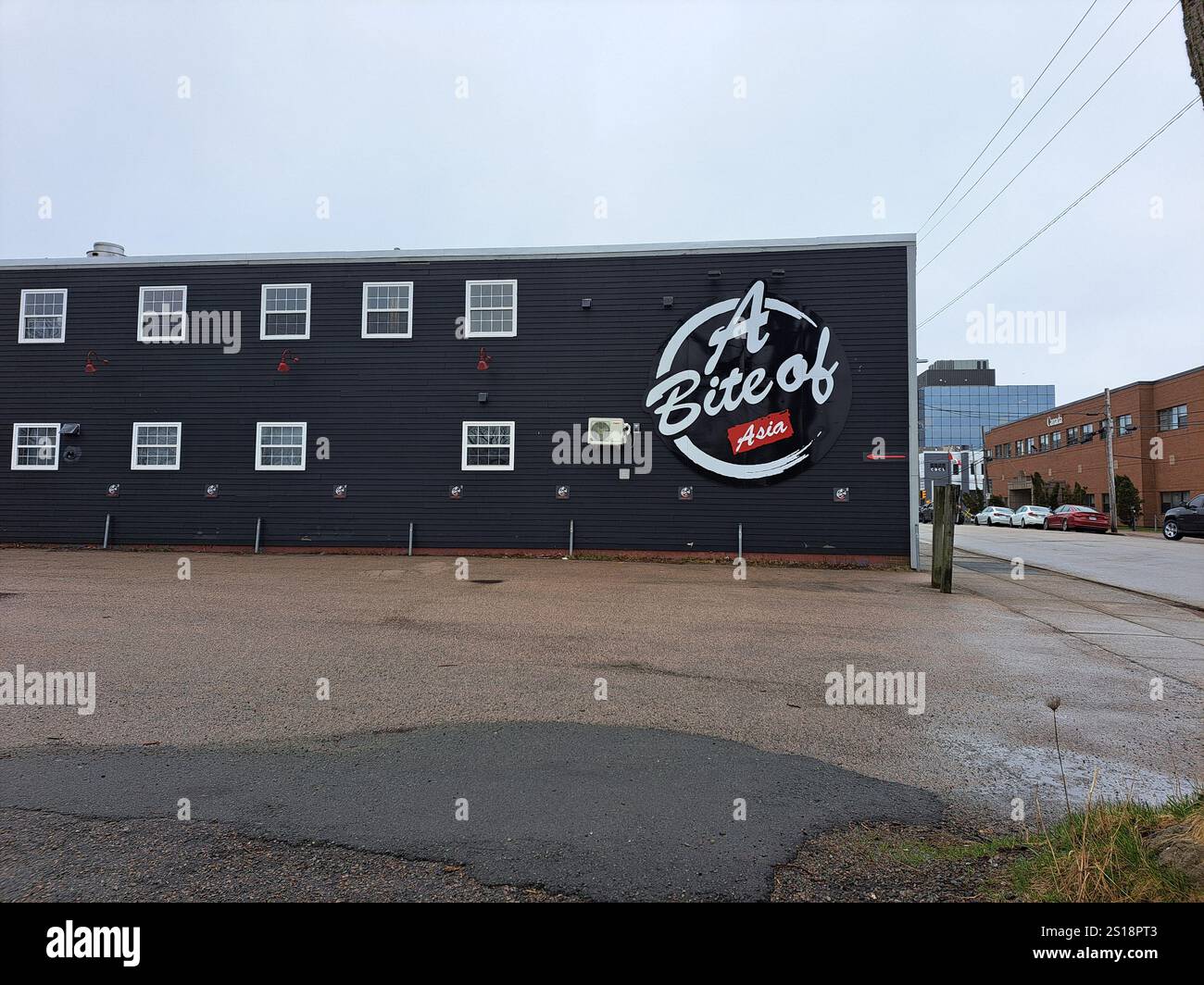 A Bite of Asia sign in downtown Sydney, Nova Scotia, Canada Stock Photo ...