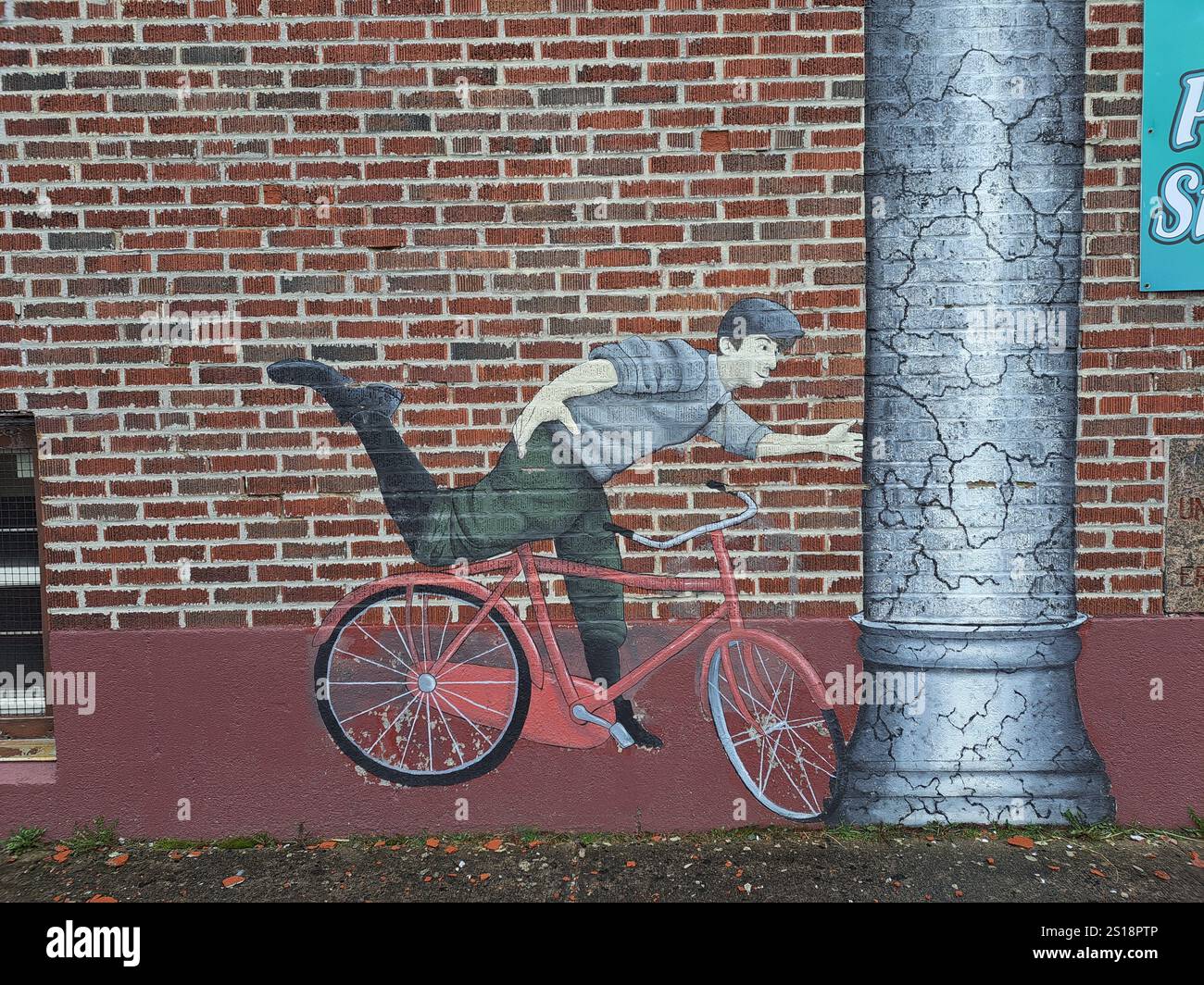 Man riding a bike mural in downtown Sydney, Nova Scotia, Canada Stock ...