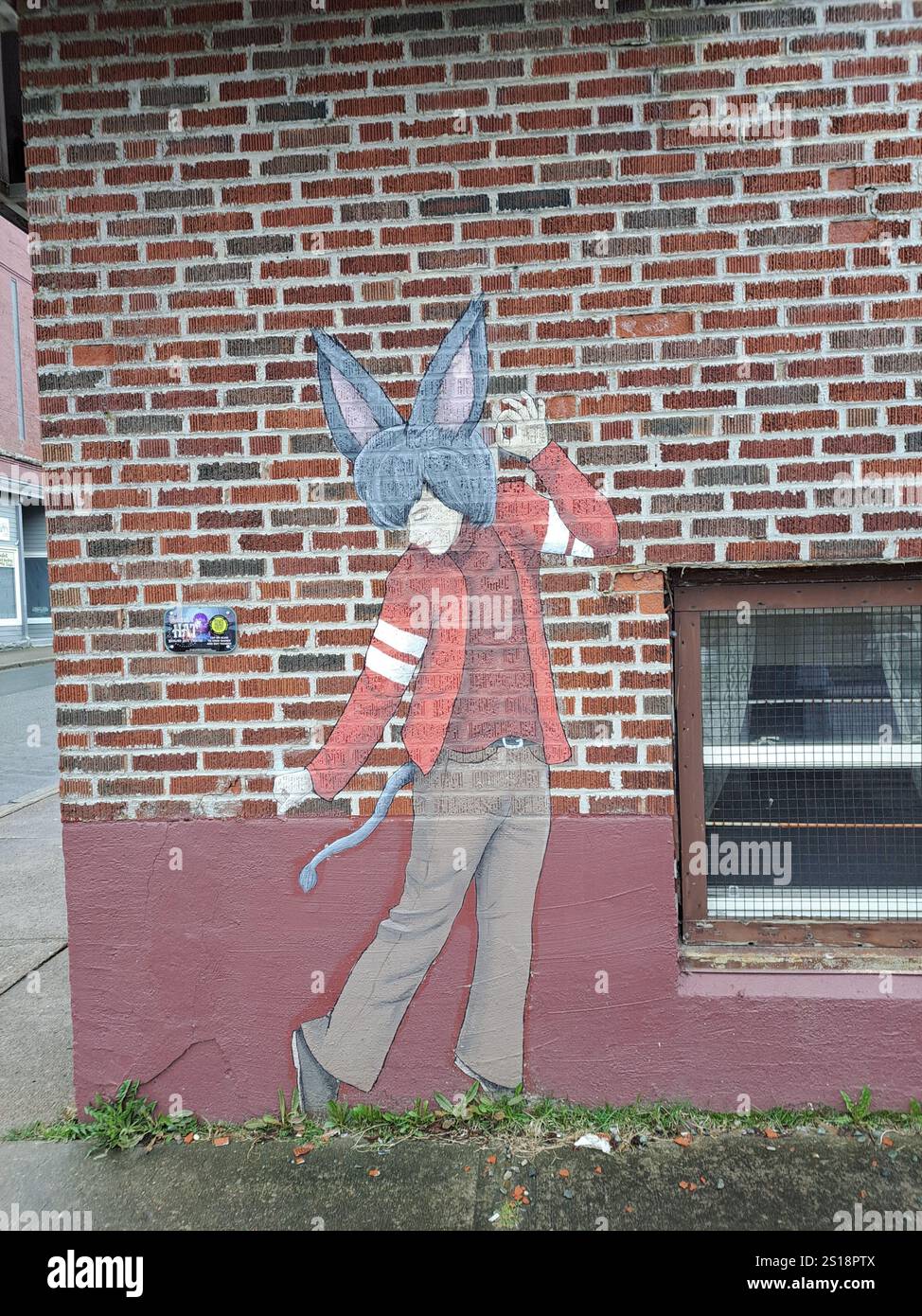 Boy wearing rabbit ears mural in downtown Sydney, Nova Scotia, Canada ...