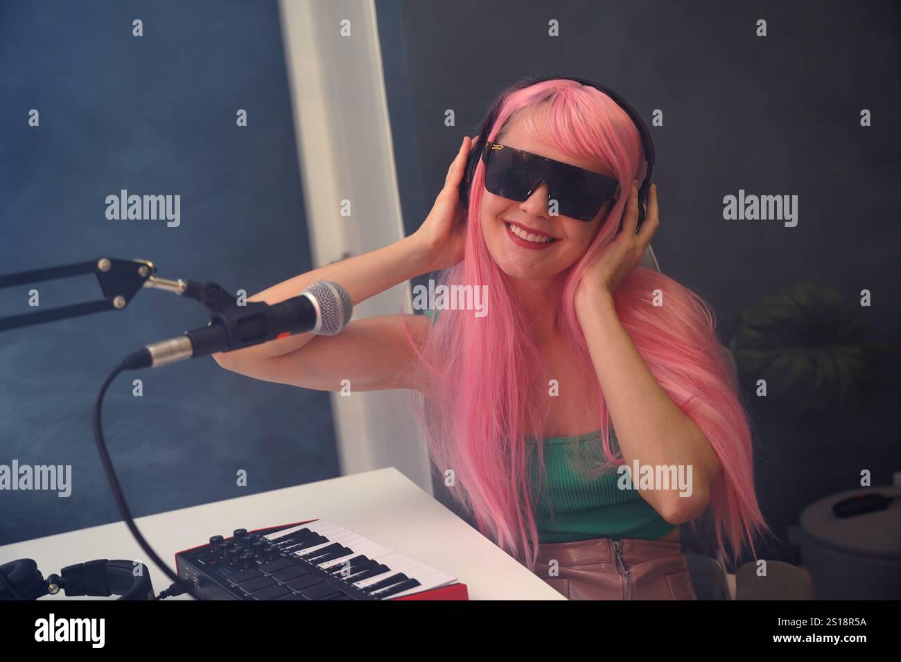 Beautiful young singer and musician broadcast from her home studio ...