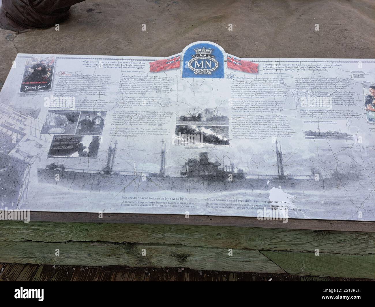 Information sign for monument depicting four men on a “board and barrel ...