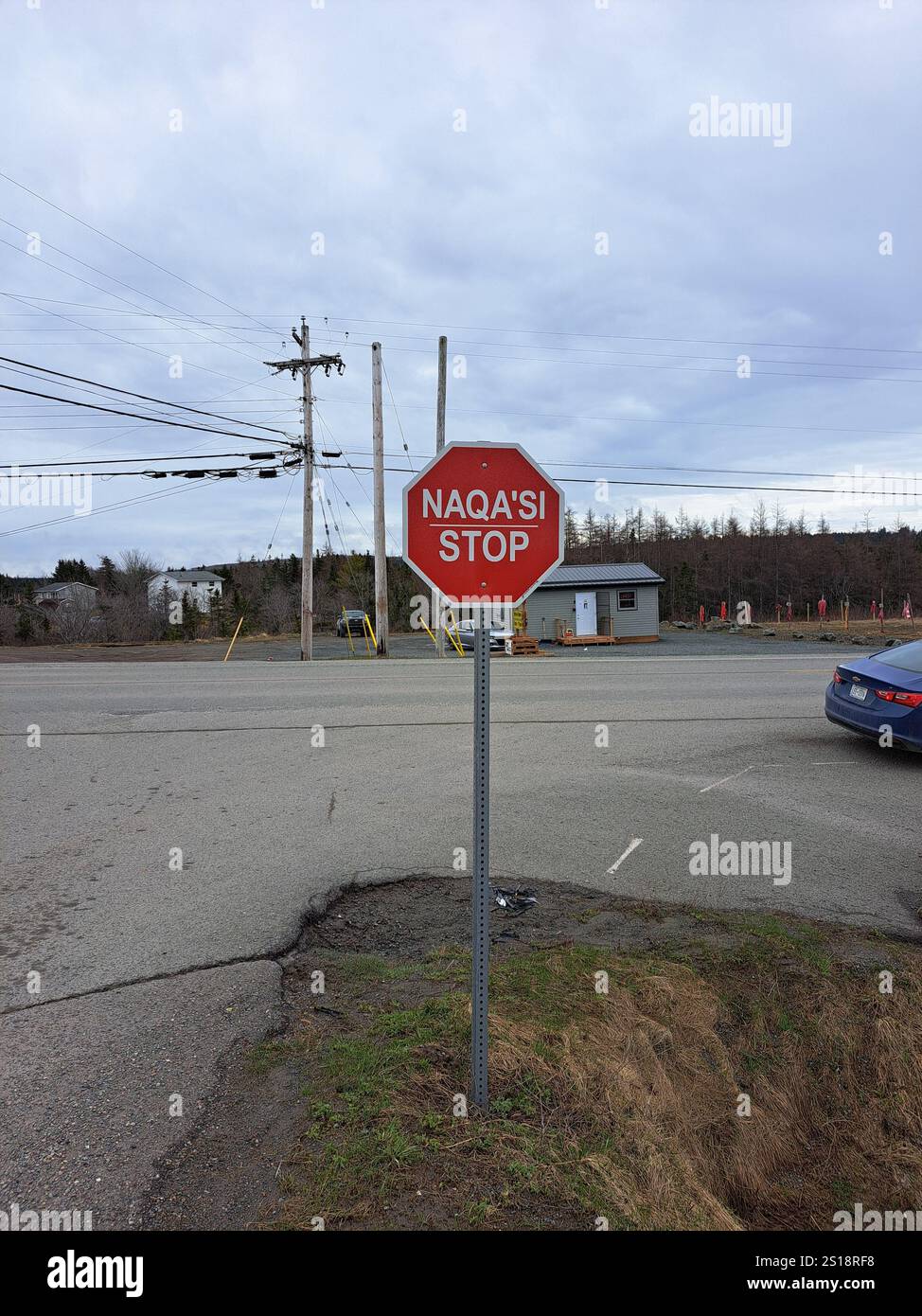 Bilingual stop sign in Potlotek, Nova Scotia, Canada Stock Photo - Alamy