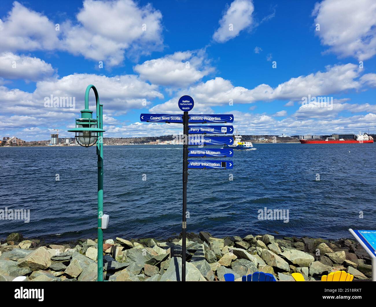 Harbourwalk signs at the waterfront boardwalk in Halifax, Nova Scotia ...