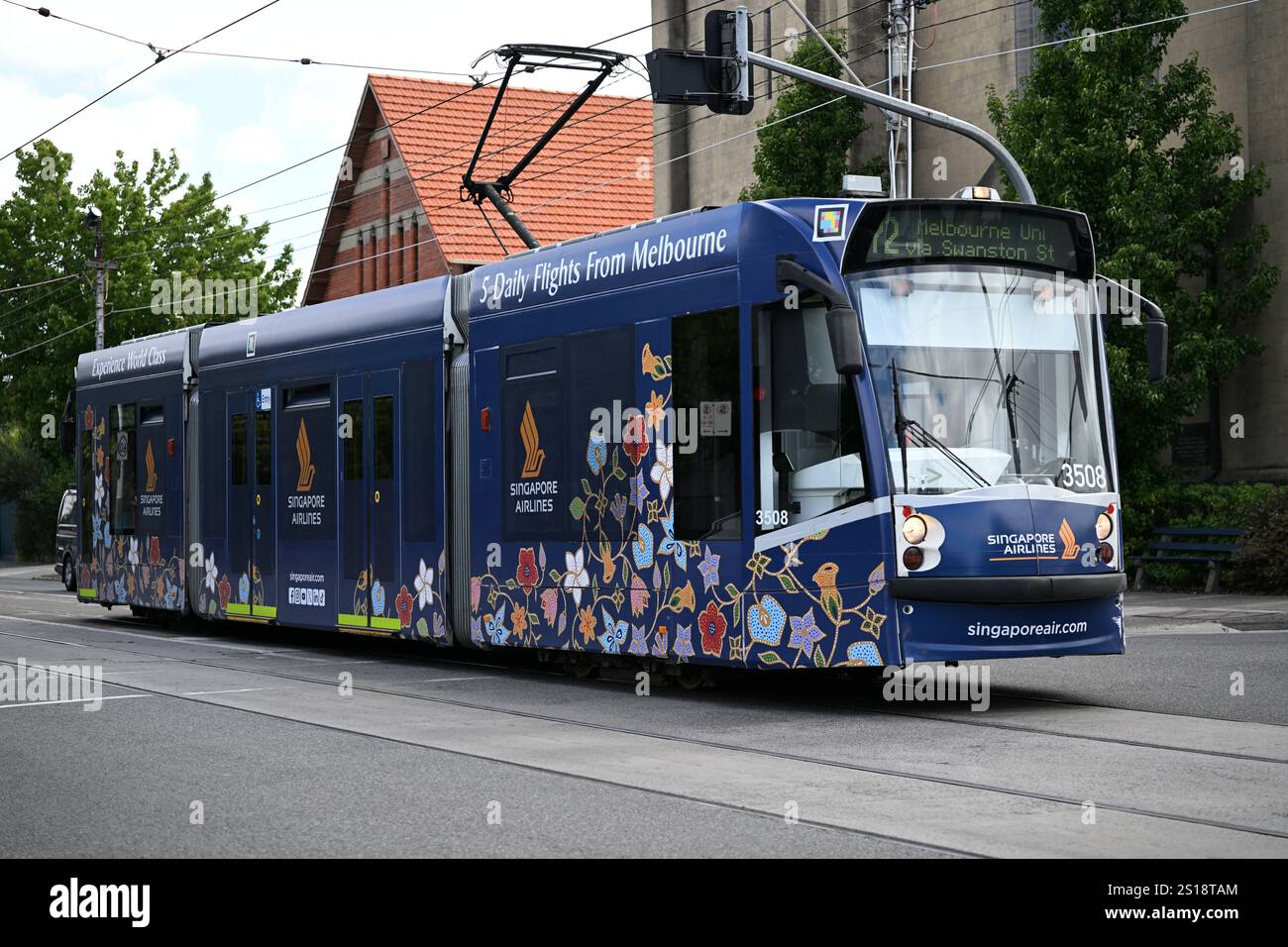 Combino low-floor tram, operated by Yarra Trams, covered with Singapore ...