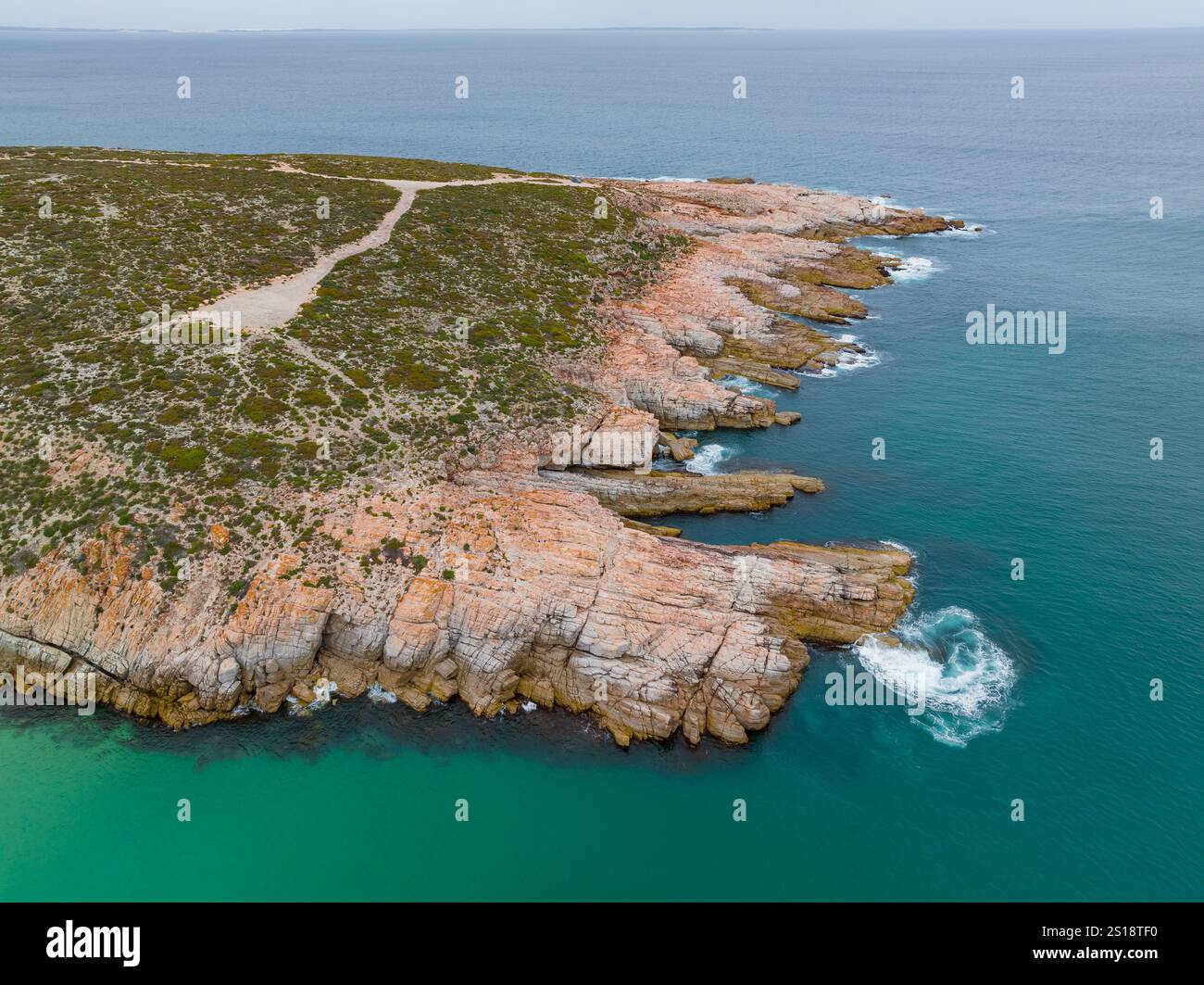 Aerial view of rocky coastline of Coles Point on the Eyrs penisula in ...