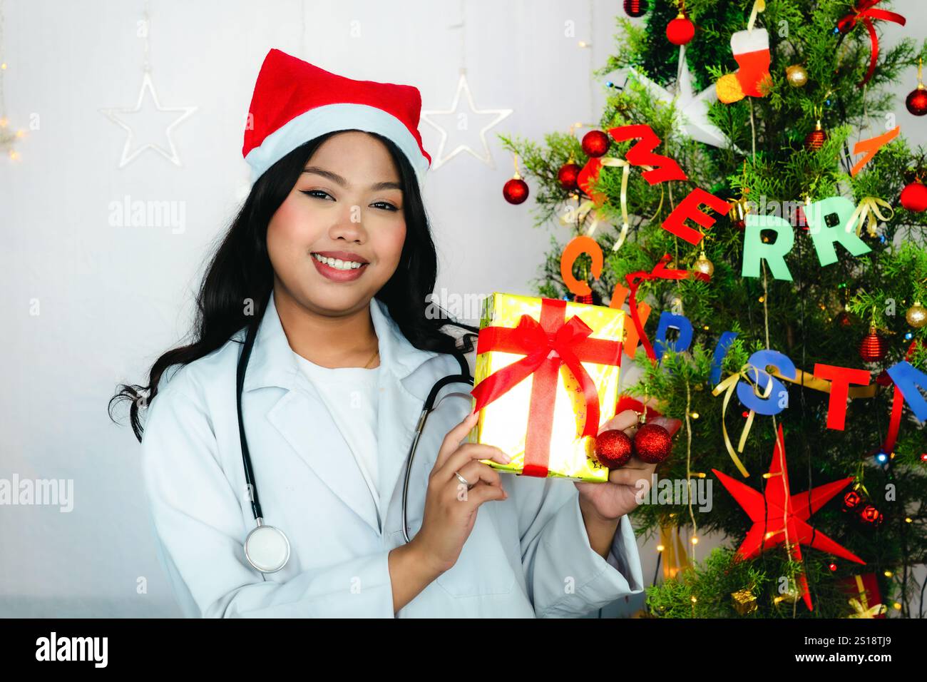 Beautiful Nurse Infront of New Year Christmas Tree in Holidays Medical ...