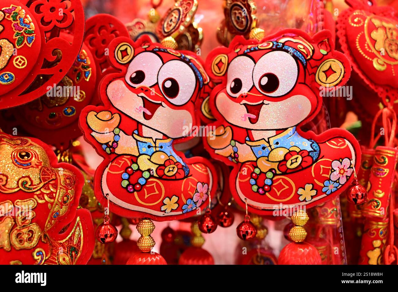 Chinese zodiac Muppets of the Year of the snake are on sale at a shop ...