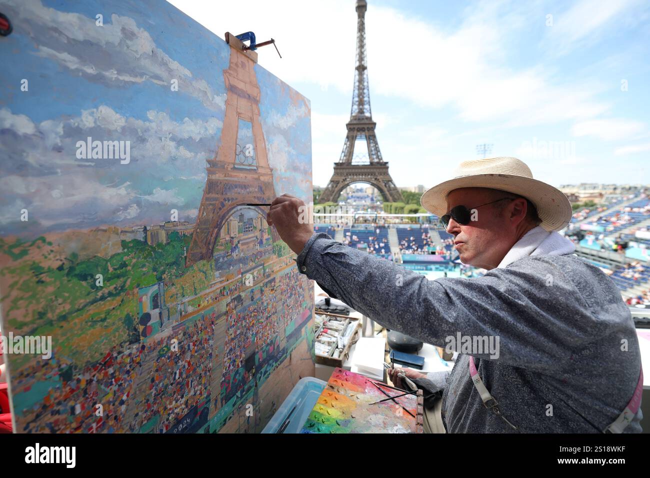 Beijing, France. 8th Aug, 2024. Painter Peter Spens works on a painting ...