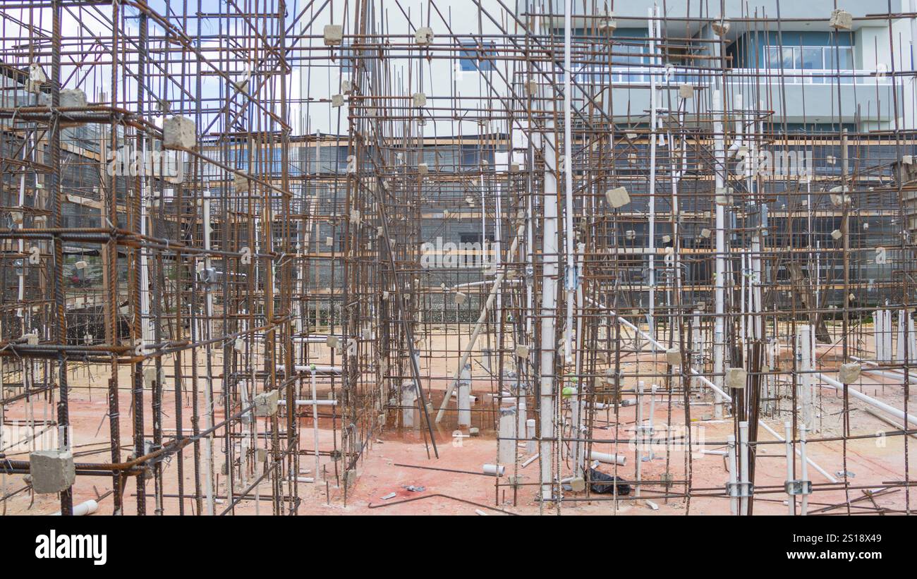 Interior of the house in electrical base construction with pipes and ...