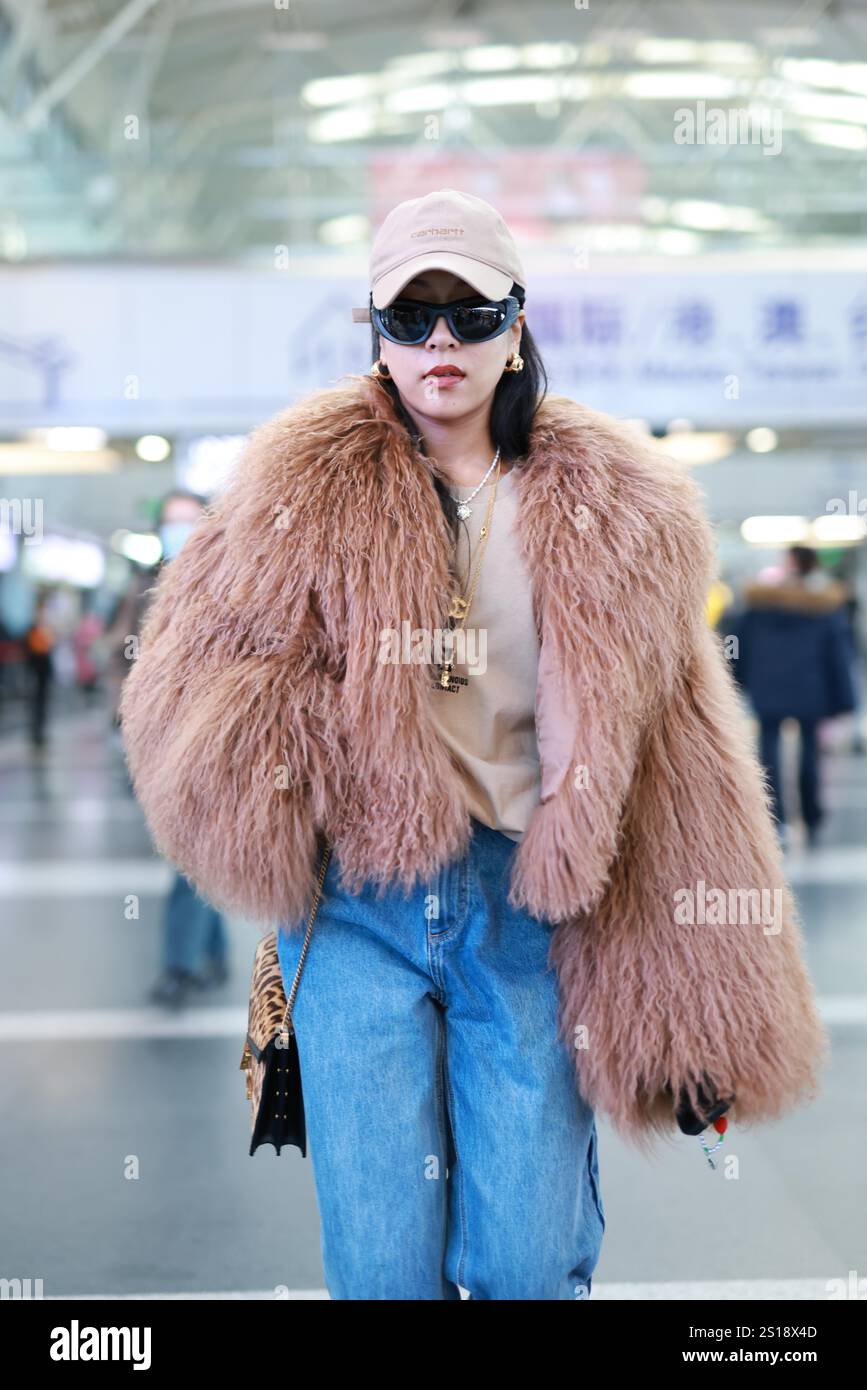 Chinese singer Jike Junyi appears at the airport in Beijing, China, 29 ...