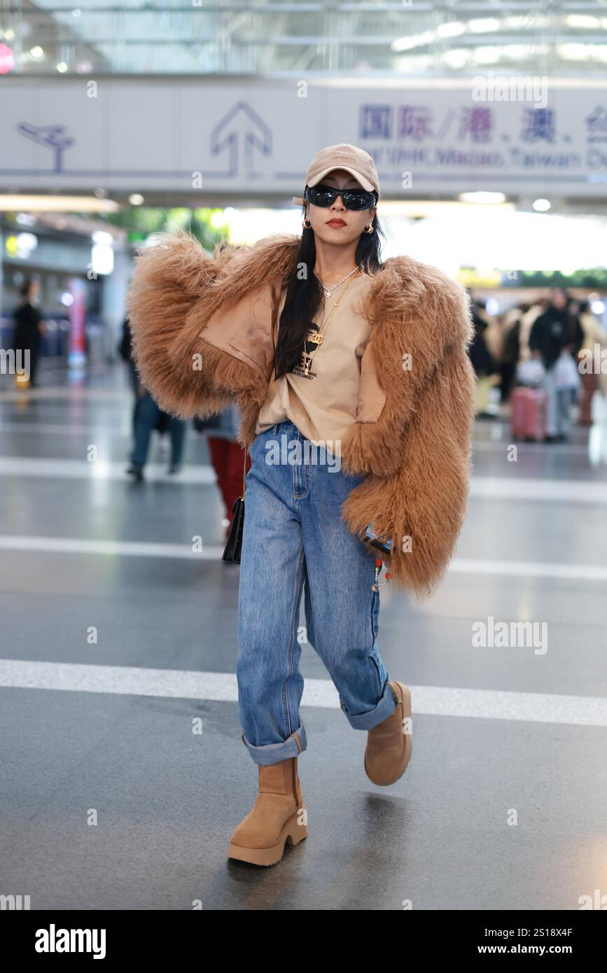 Chinese singer Jike Junyi appears at the airport in Beijing, China, 29 ...