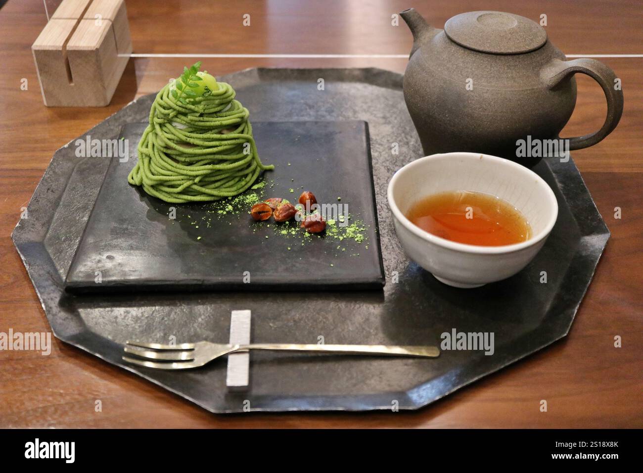 Matcha Mont Blanc cake and hot tea in Tokyo, Japan Stock Photo - Alamy